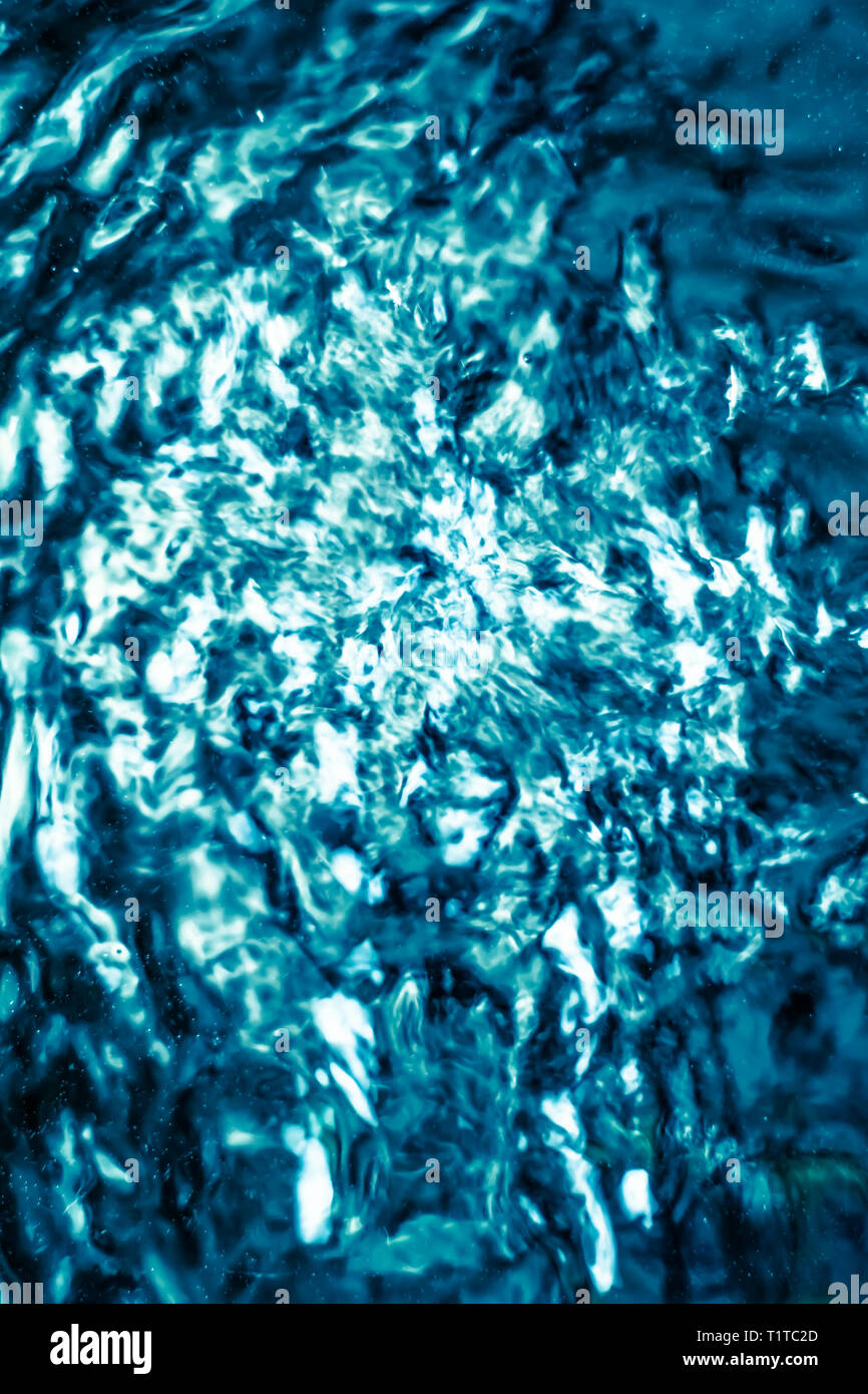 Abstract blue liquid surface as background - futuristic design and ...