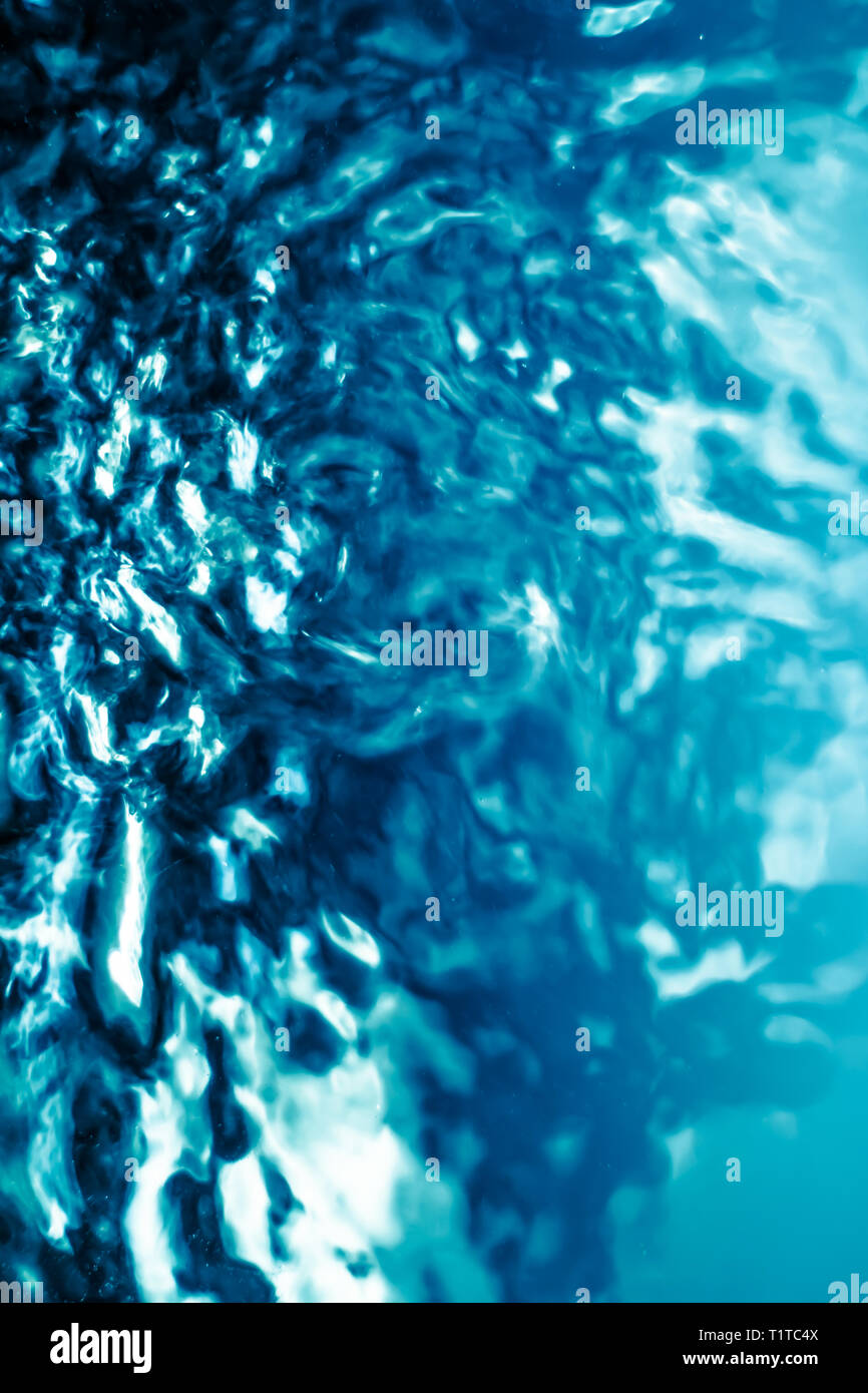 Abstract blue liquid surface as background - futuristic design and ...