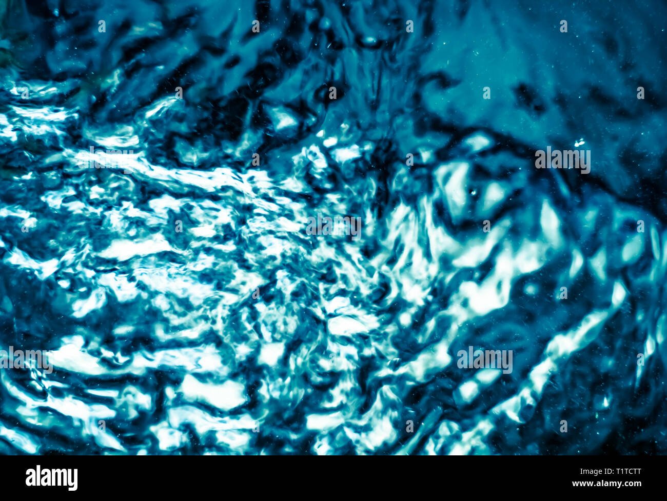 Abstract blue liquid surface as background - futuristic design and ...