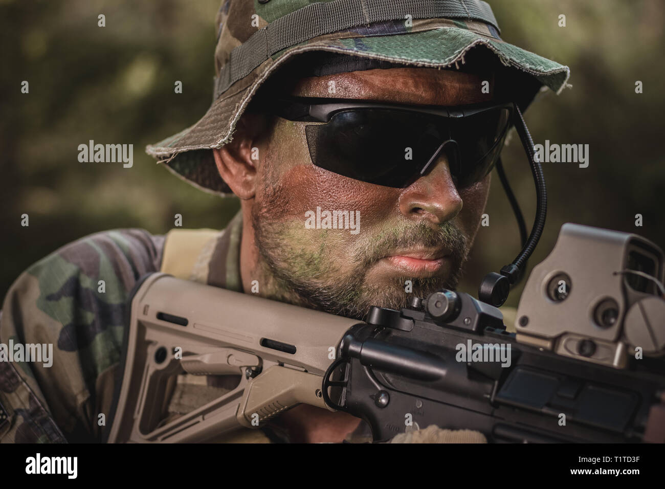 Special Forces soldier with an assault rifle in the forest Stock Photo ...