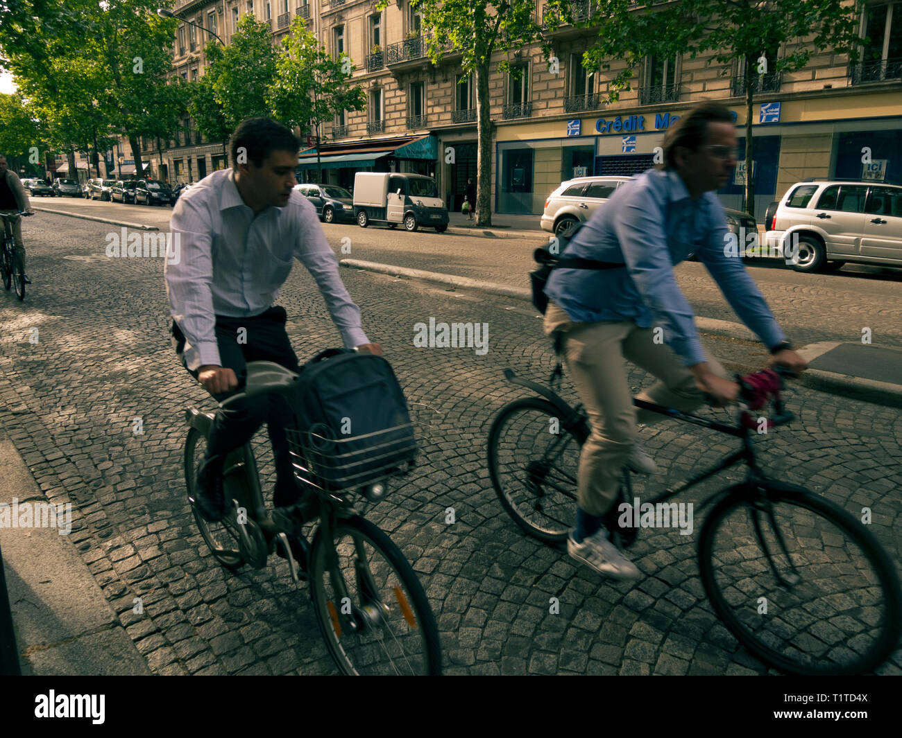 Male cyclists in Paris, France Stock Photo - Alamy