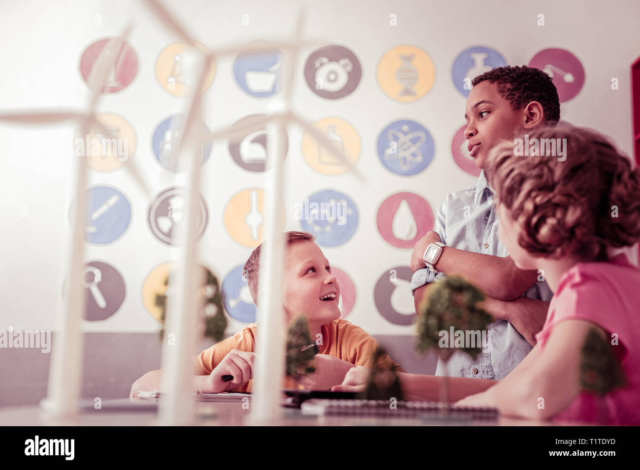 Group Of School Children Discussing High Resolution Stock Photography ...