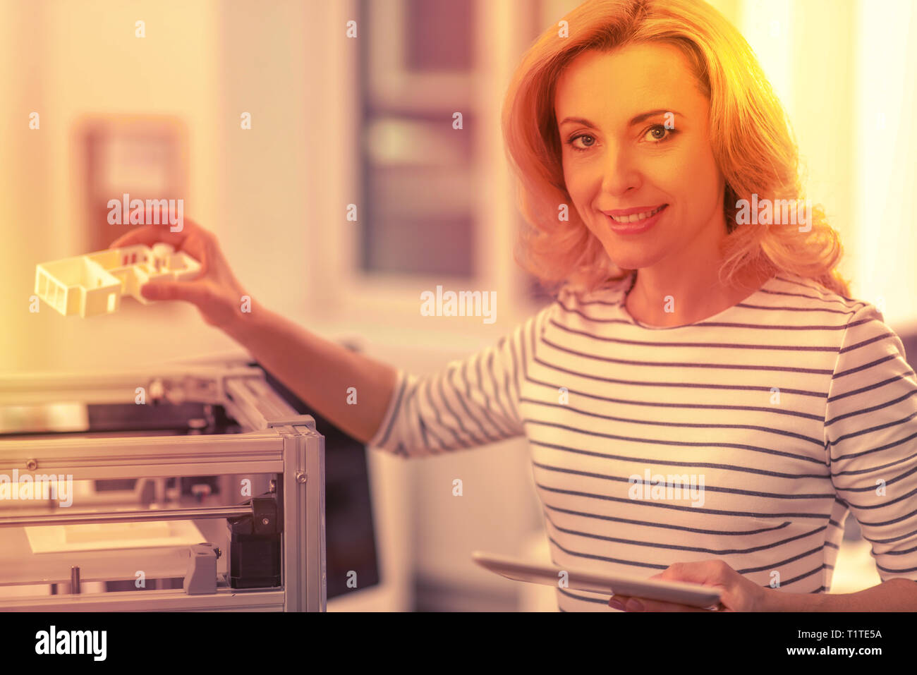 Smiling gently hi-res stock photography and images - Alamy