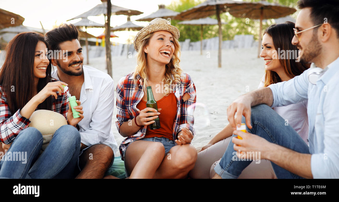 Happy friends laughing and smiling outdoors Stock Photo - Alamy