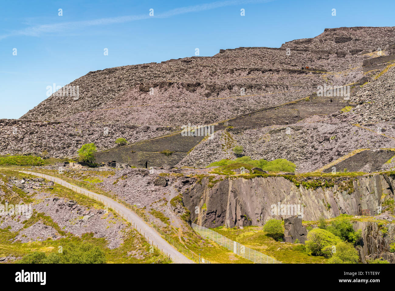 Walking in the derelict Dinorwic Quarry near Llanberis, Gwynedd, Wales ...