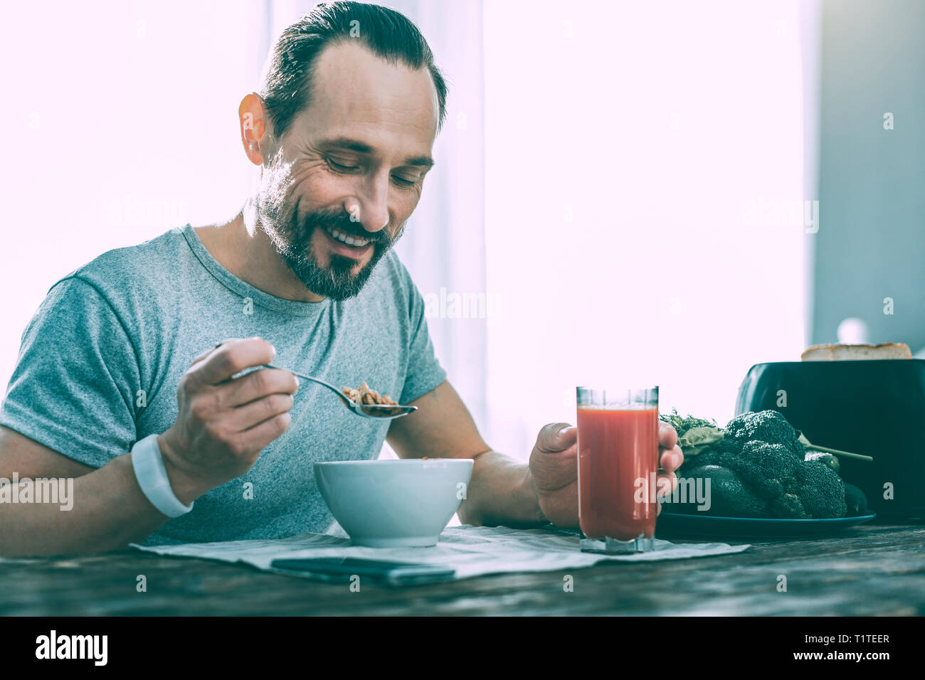 Man having breakfast cereals hi-res stock photography and images - Alamy