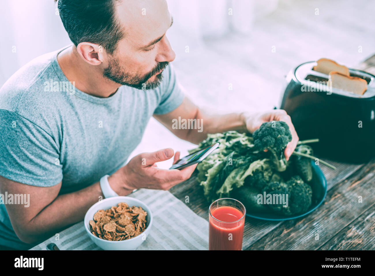 Man eat broccoli hi-res stock photography and images - Alamy