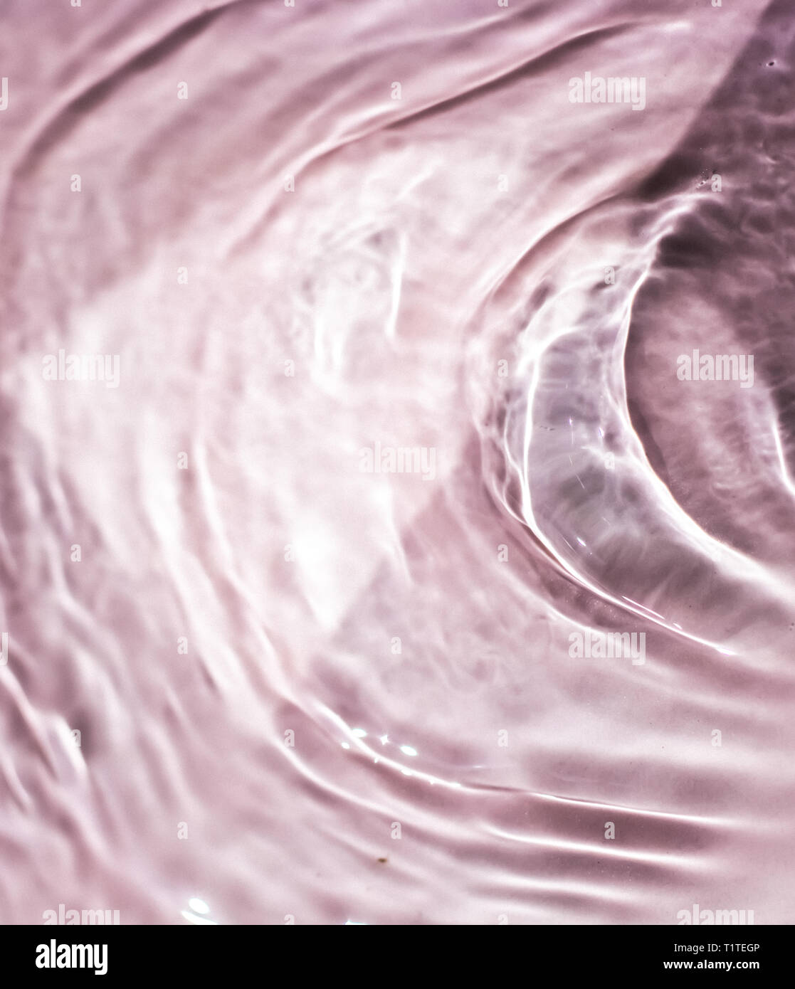 Pink flowing water texture as an abstract background - colourful ...