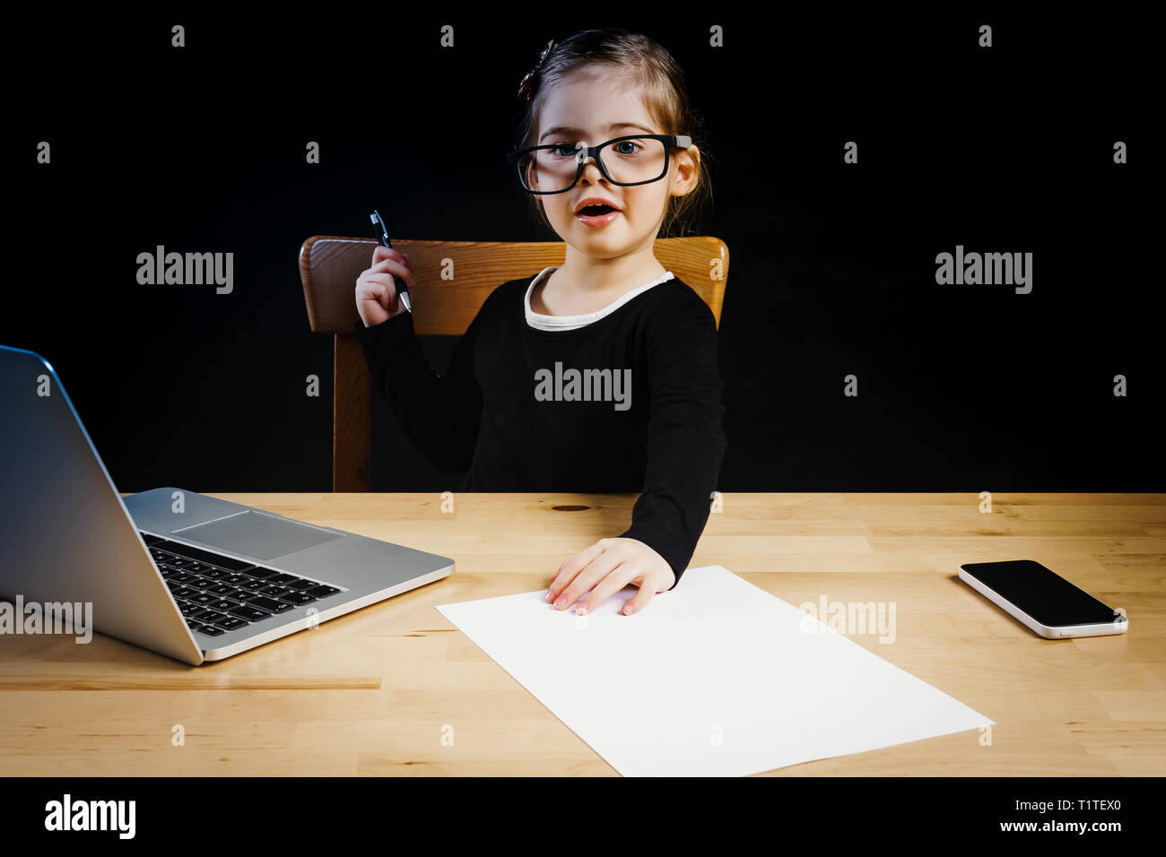 little girl in the office preparing the document for signature Stock ...