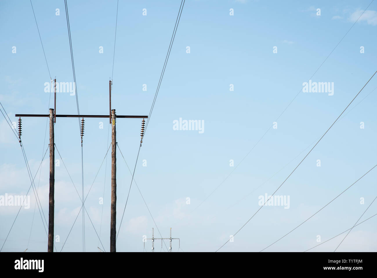 High tension electrical power grid post with thick cable wires set ...