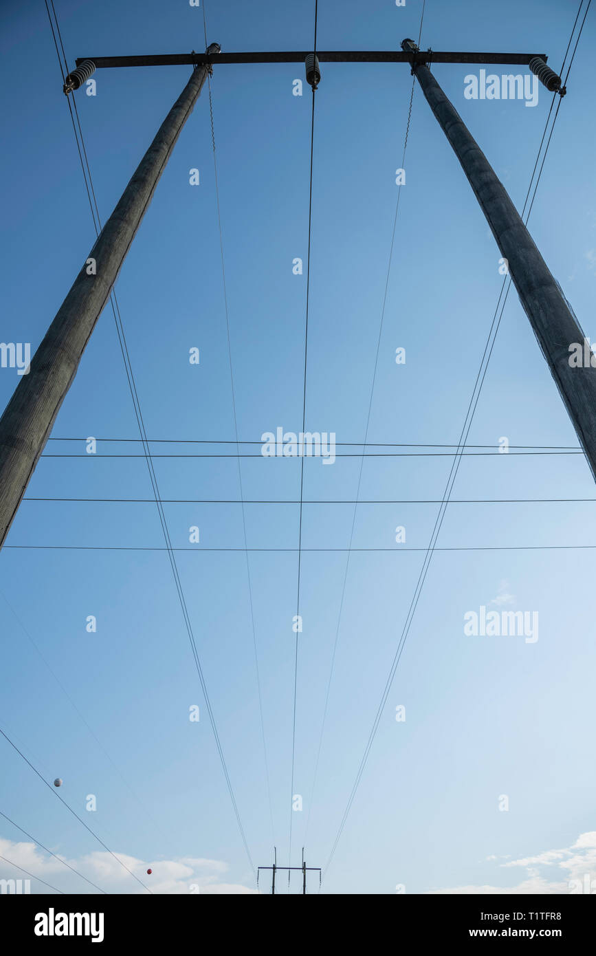 High tension electrical power grid post with thick cable wires set ...