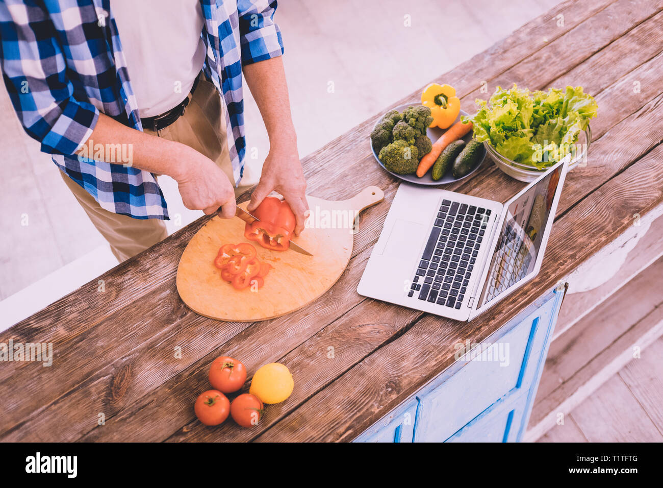 Inspired man spending a day in the kitchen Stock Photo - Alamy