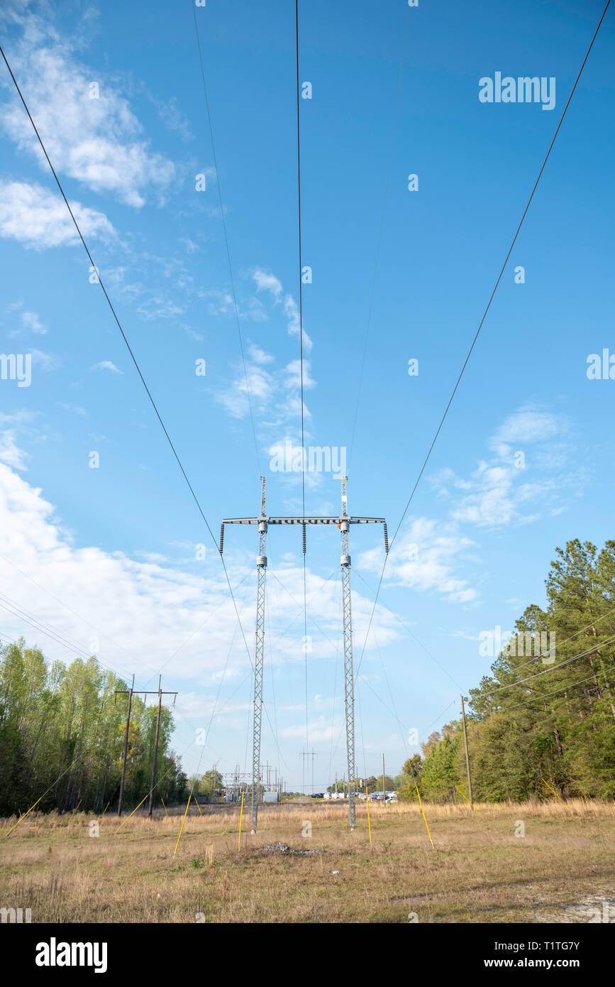 High tension electrical power grid post with thick cable wires set ...