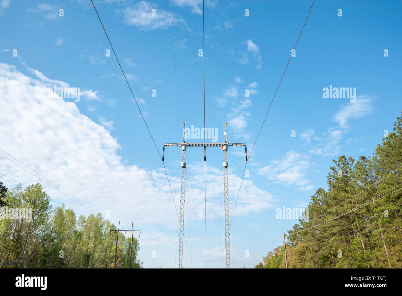 High tension electrical power grid post with thick cable wires set ...