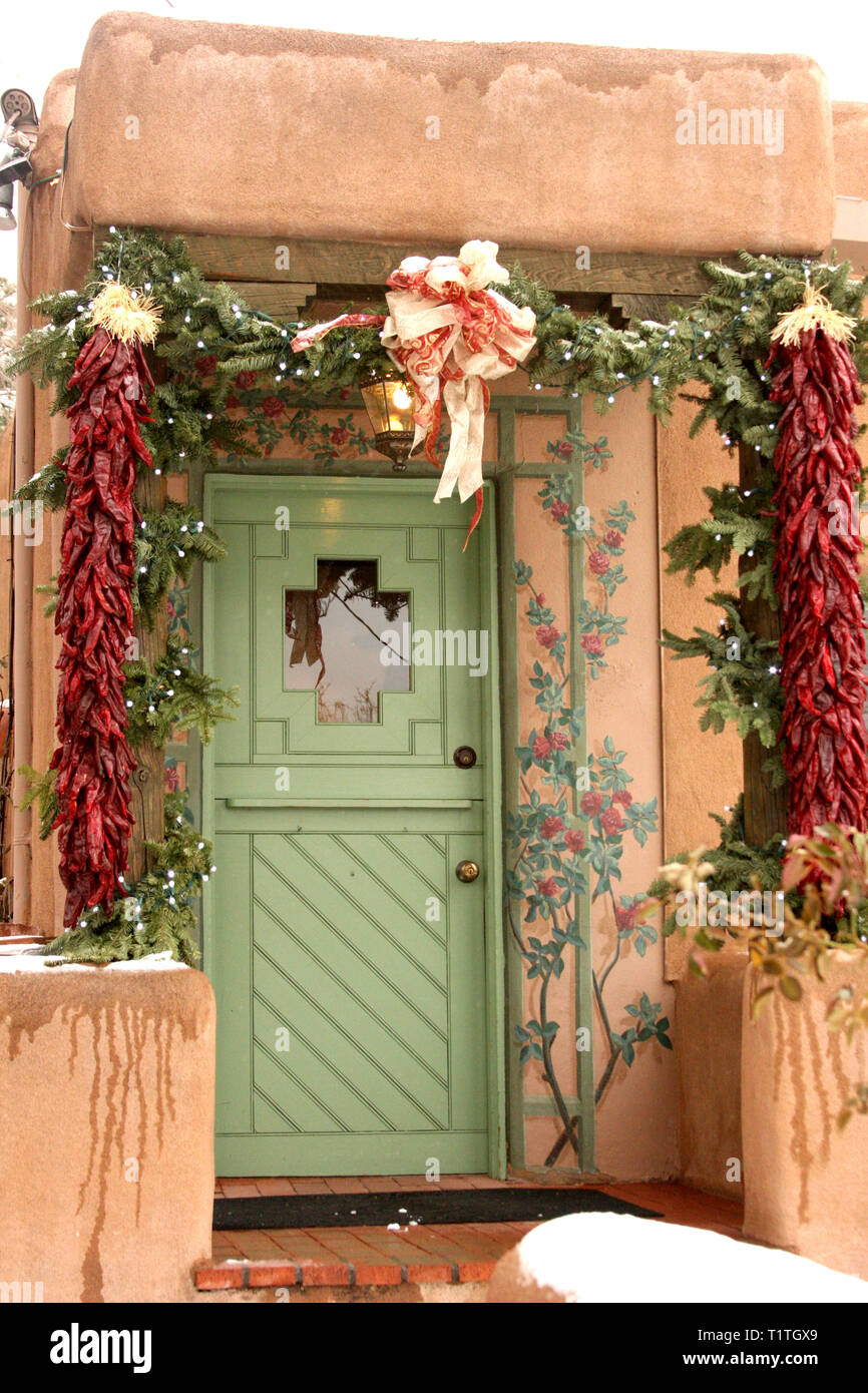 Ristras at the entrance of traditional house in Santa Fe, New Mexico ...