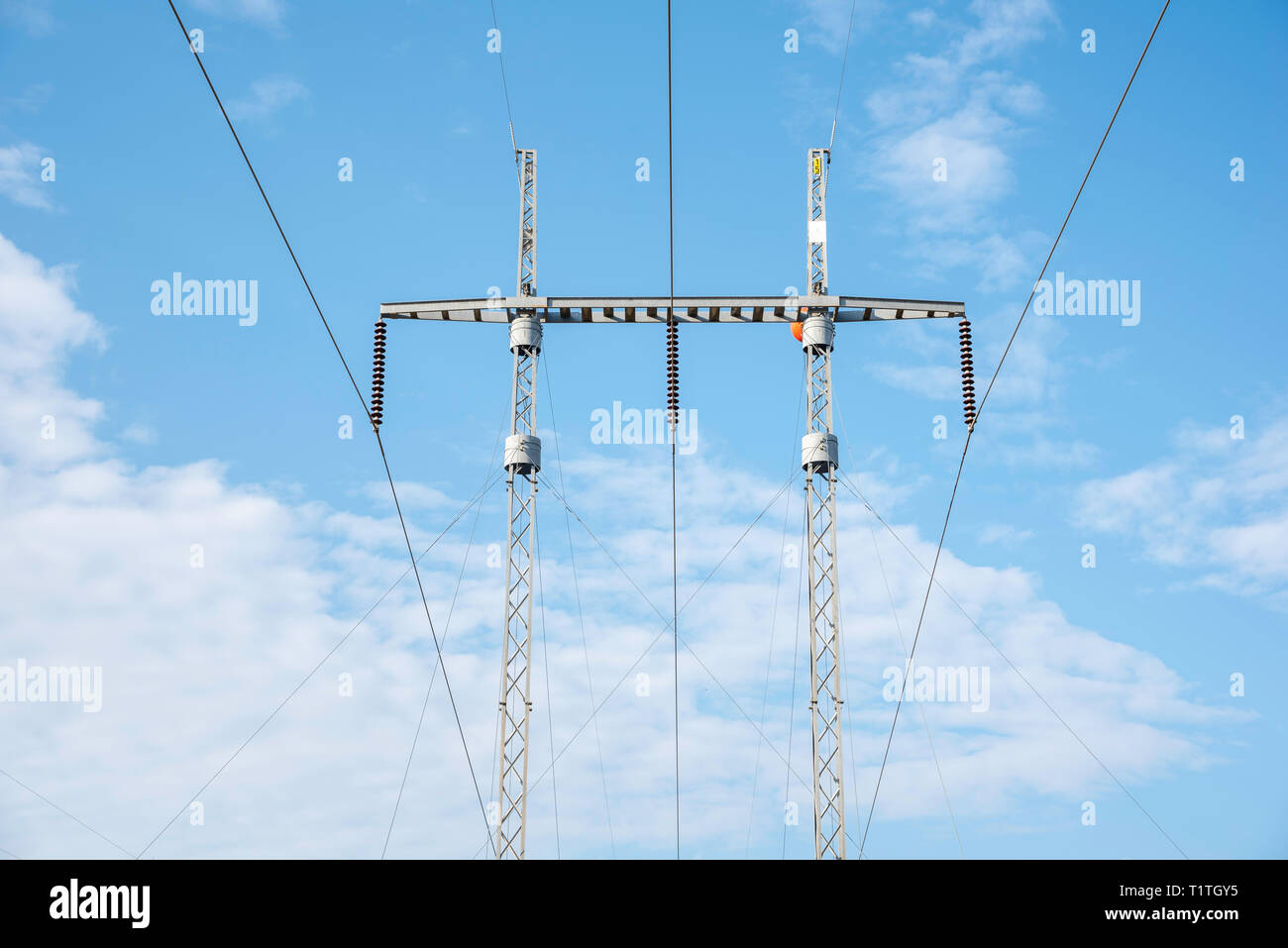 High tension electrical power grid post with thick cable wires set ...