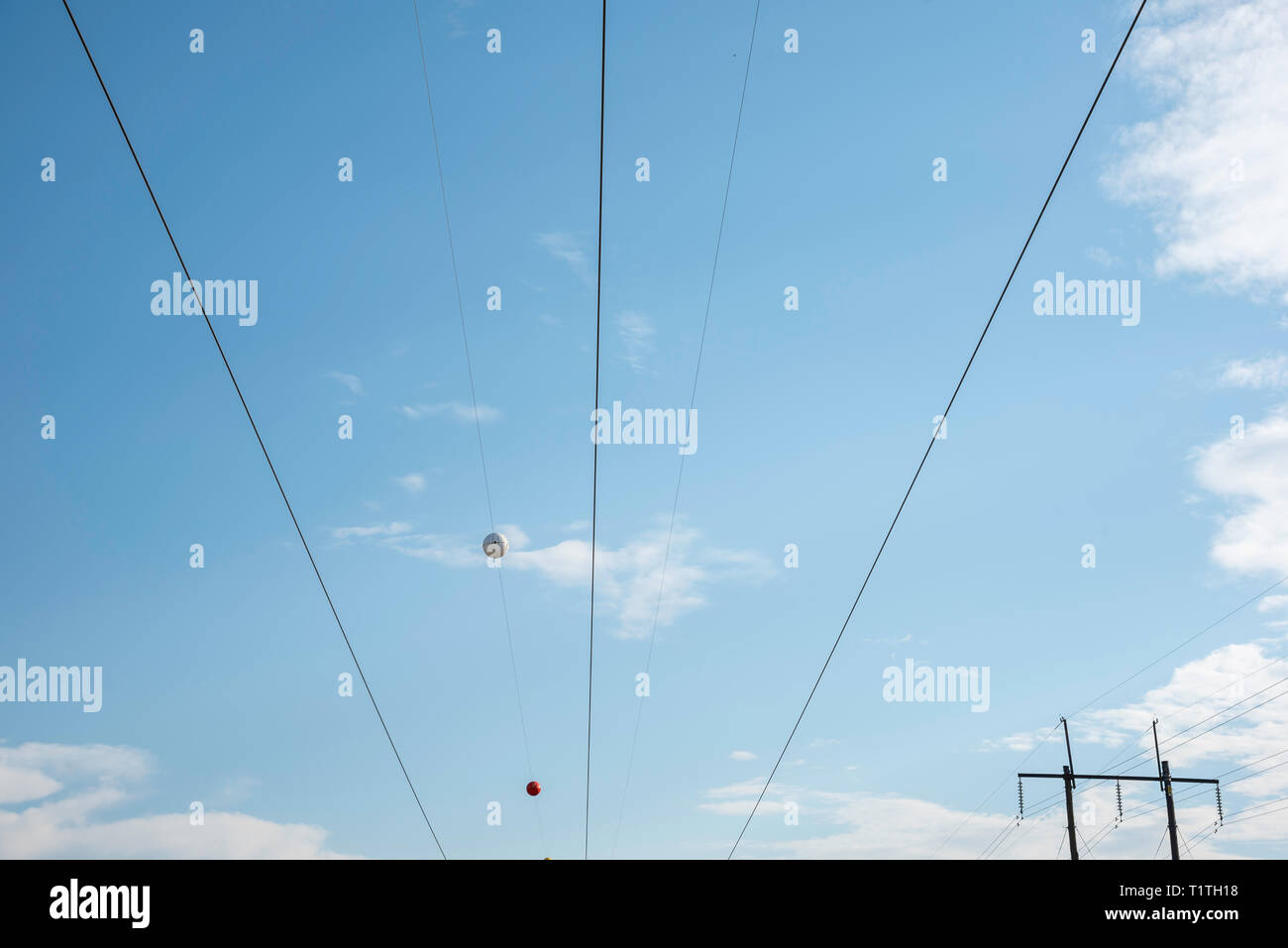 High tension electrical power grid post with thick cable wires set ...