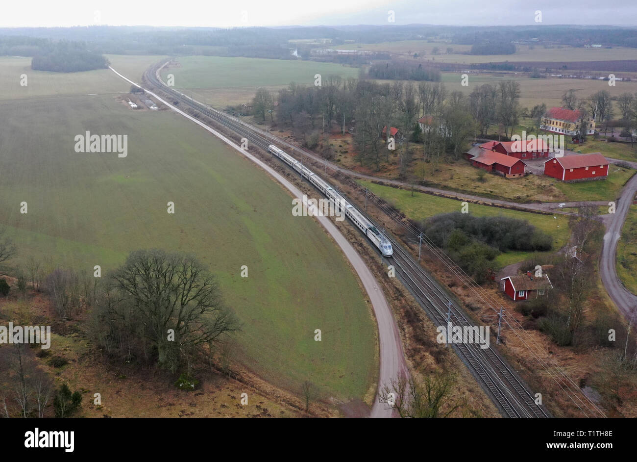 MJÖLBY 20190304 Aerial view of a railway and the high-speed train X2000 ...