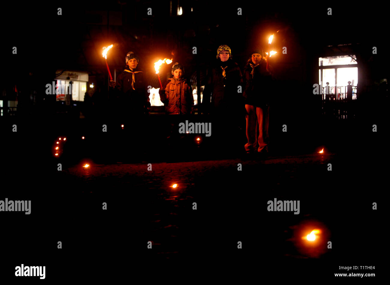 People in a square during Earth Hour Stock Photo - Alamy
