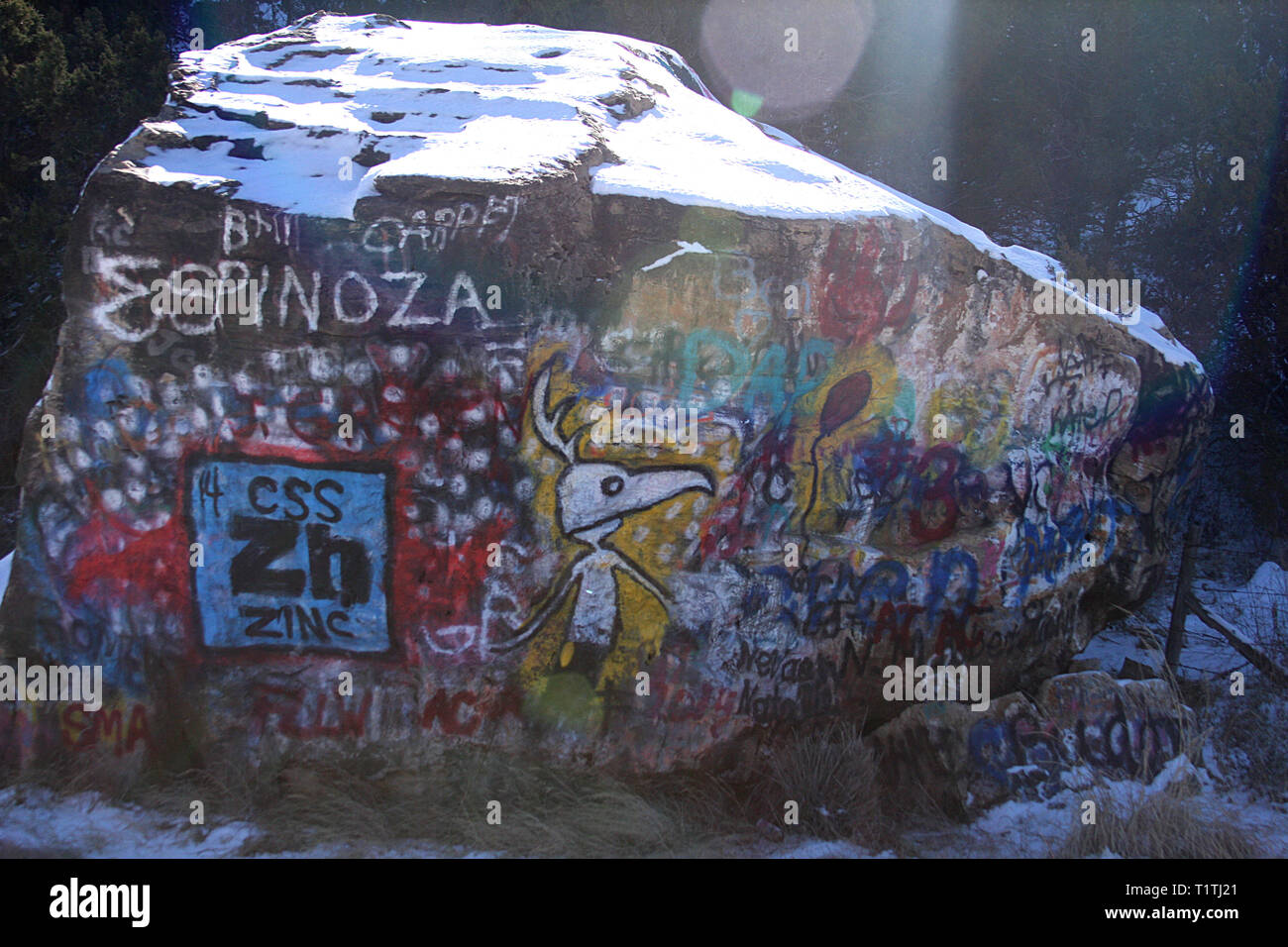 Large rock spray-painted Stock Photo - Alamy