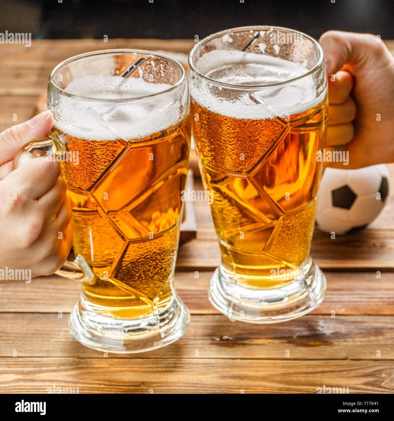 Appetizers and beer on the table for watch the football match Stock ...