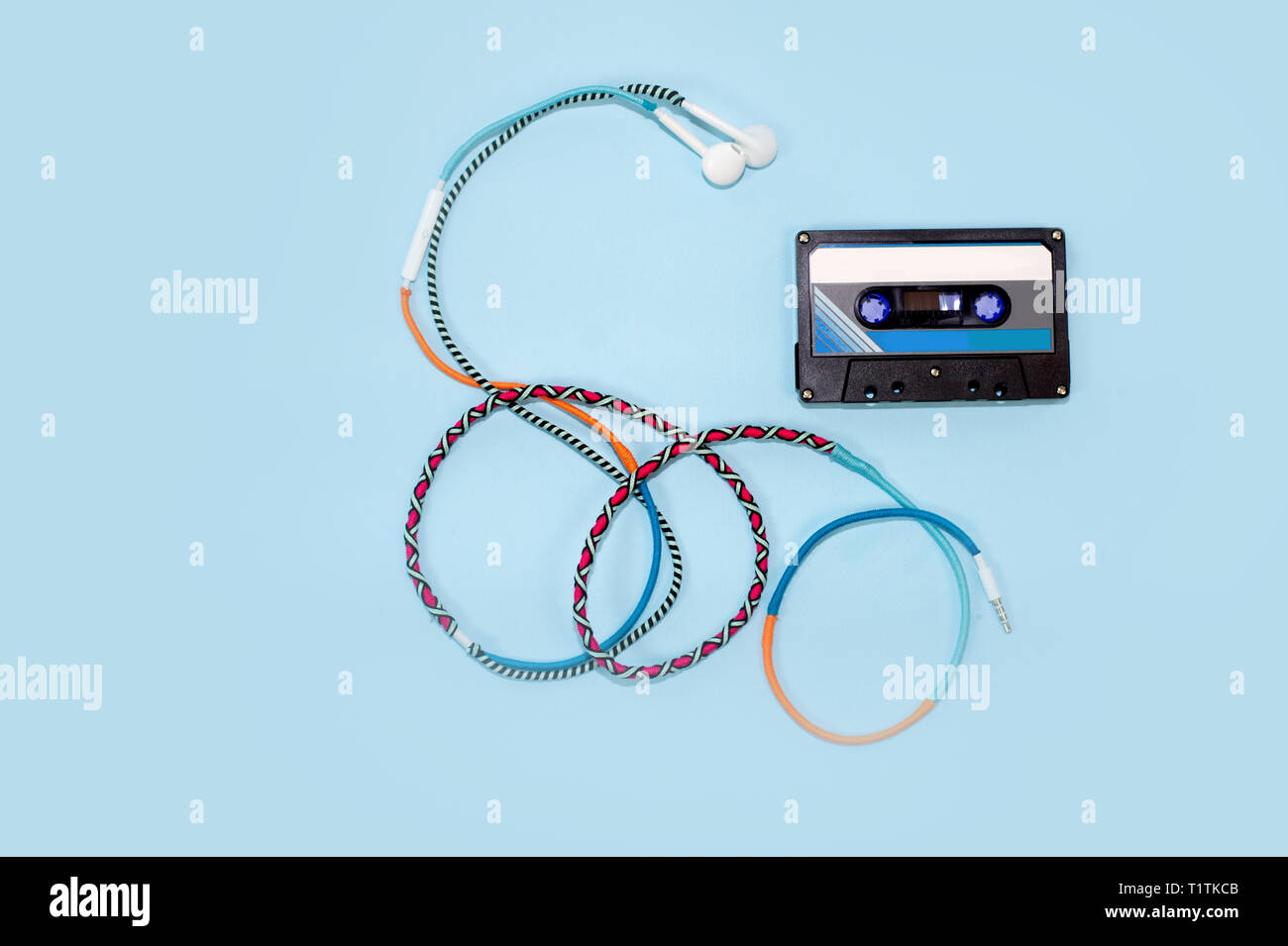 Top view retro tape cassette with colourful earphone Stock Photo - Alamy