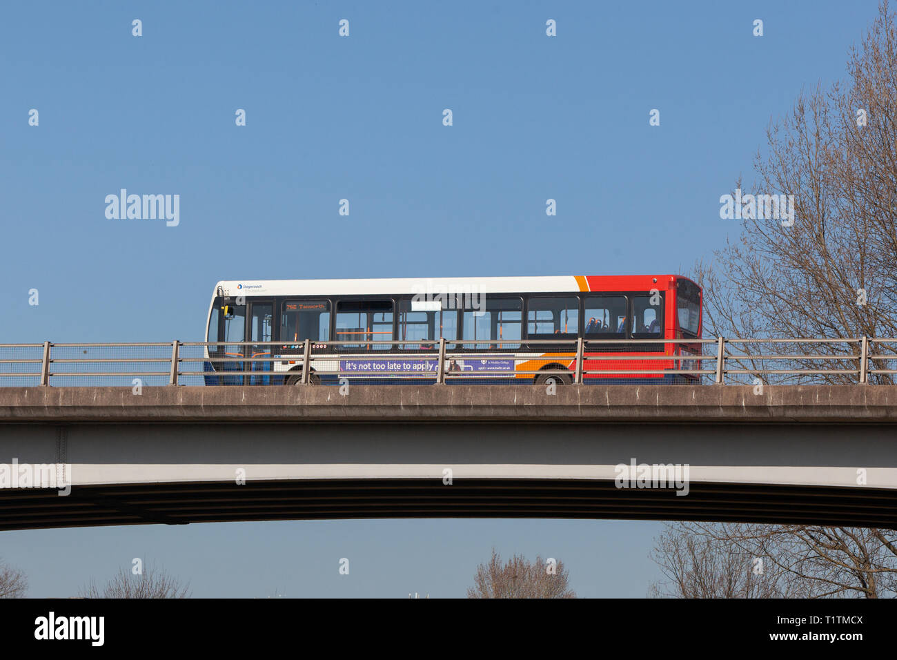 Single decker bus public transport.Travelling on the road network in ...