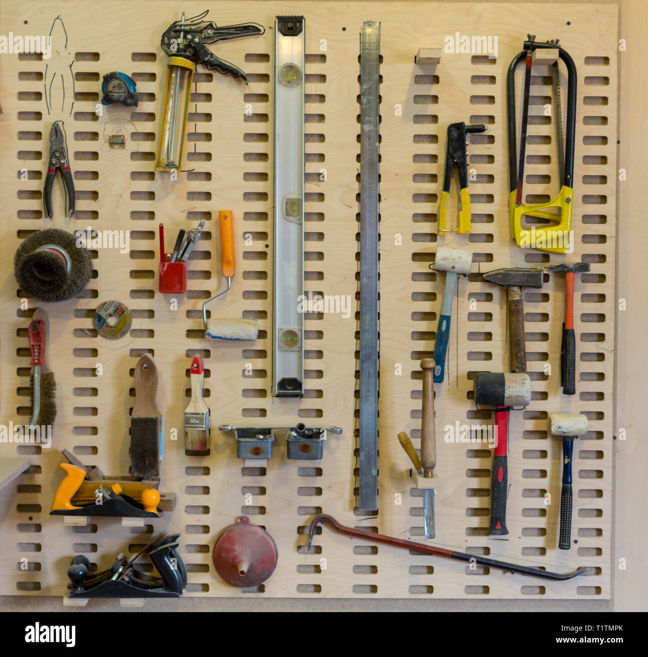 Collection of vintage carpentry tools on an old workbench: woodworking ...