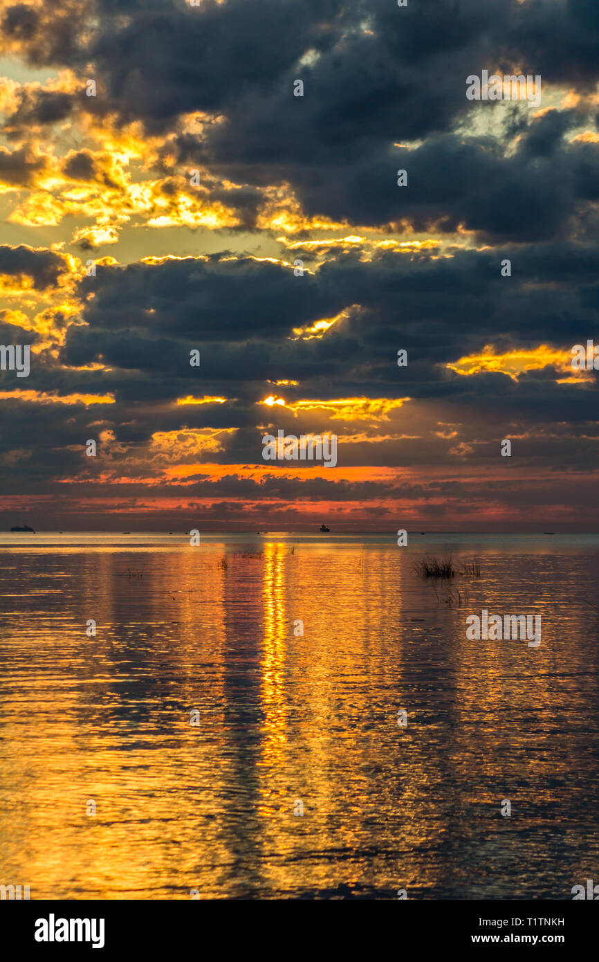 Unusual sunset on the sea. Sea sunset background. Evening sunset Sea ...