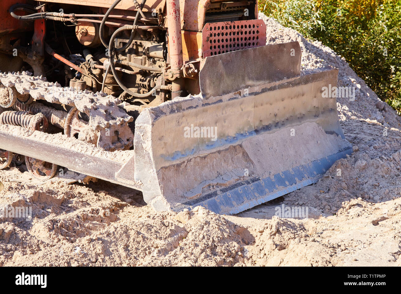 Sand quarry. Bulldozer working on sand dunes. Pure lake sand. Old sand ...