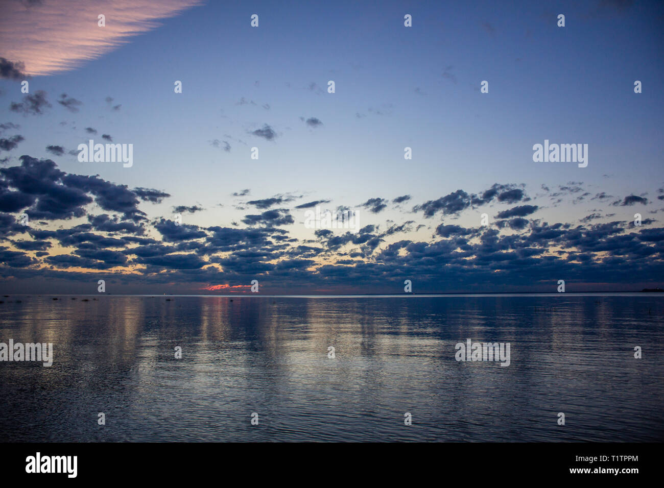 Unusual sunset on the sea. Sea sunset background. Evening sunset Sea ...