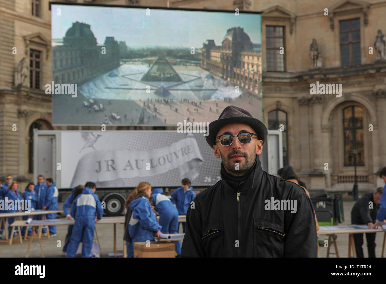 The street artist JR transforms the courtyard of the Louvre. For the ...
