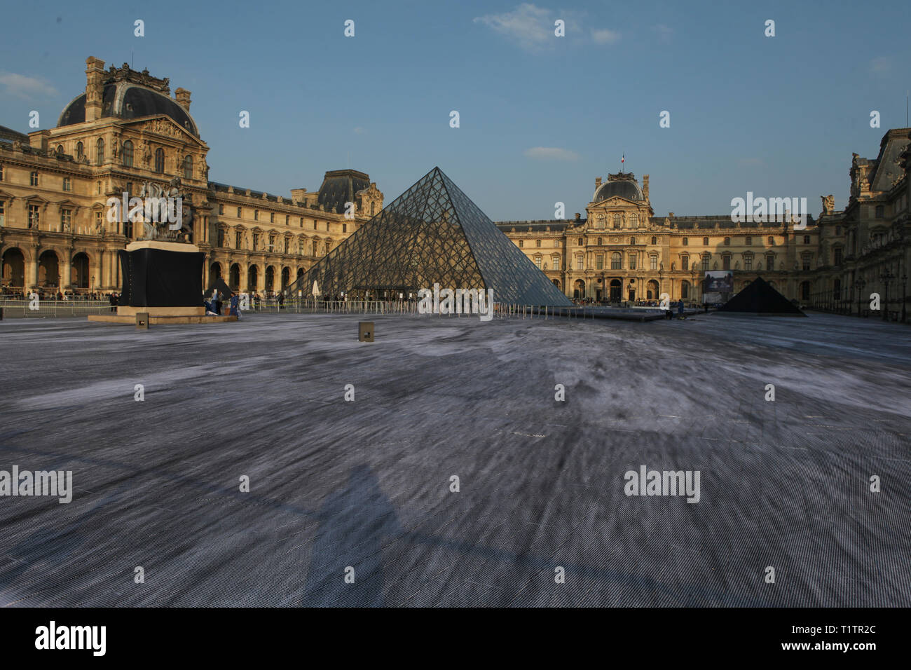 The street artist JR transforms the courtyard of the Louvre. For the ...