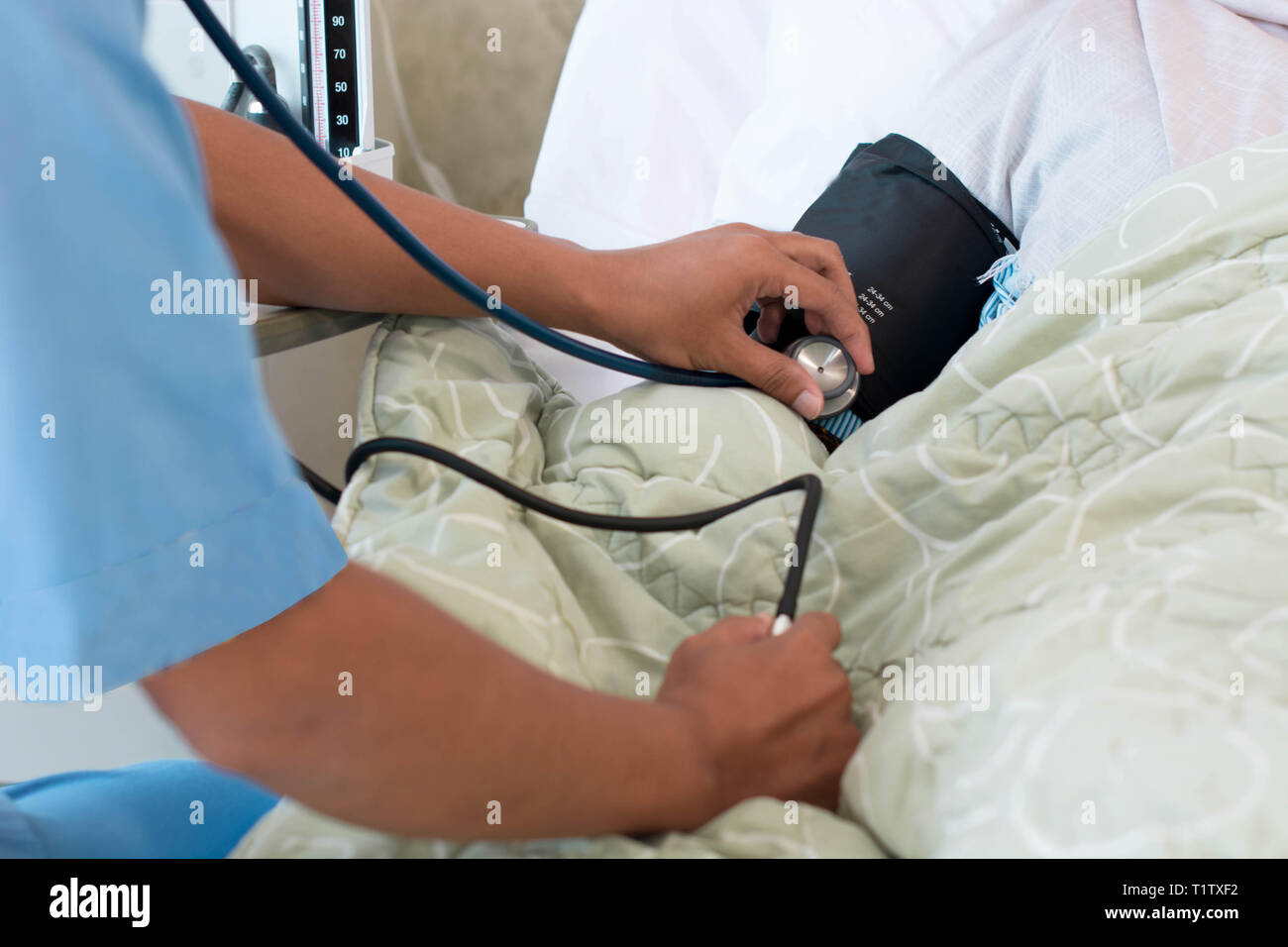 nurse and patient interaction at hospital clinic bed room Stock Photo ...
