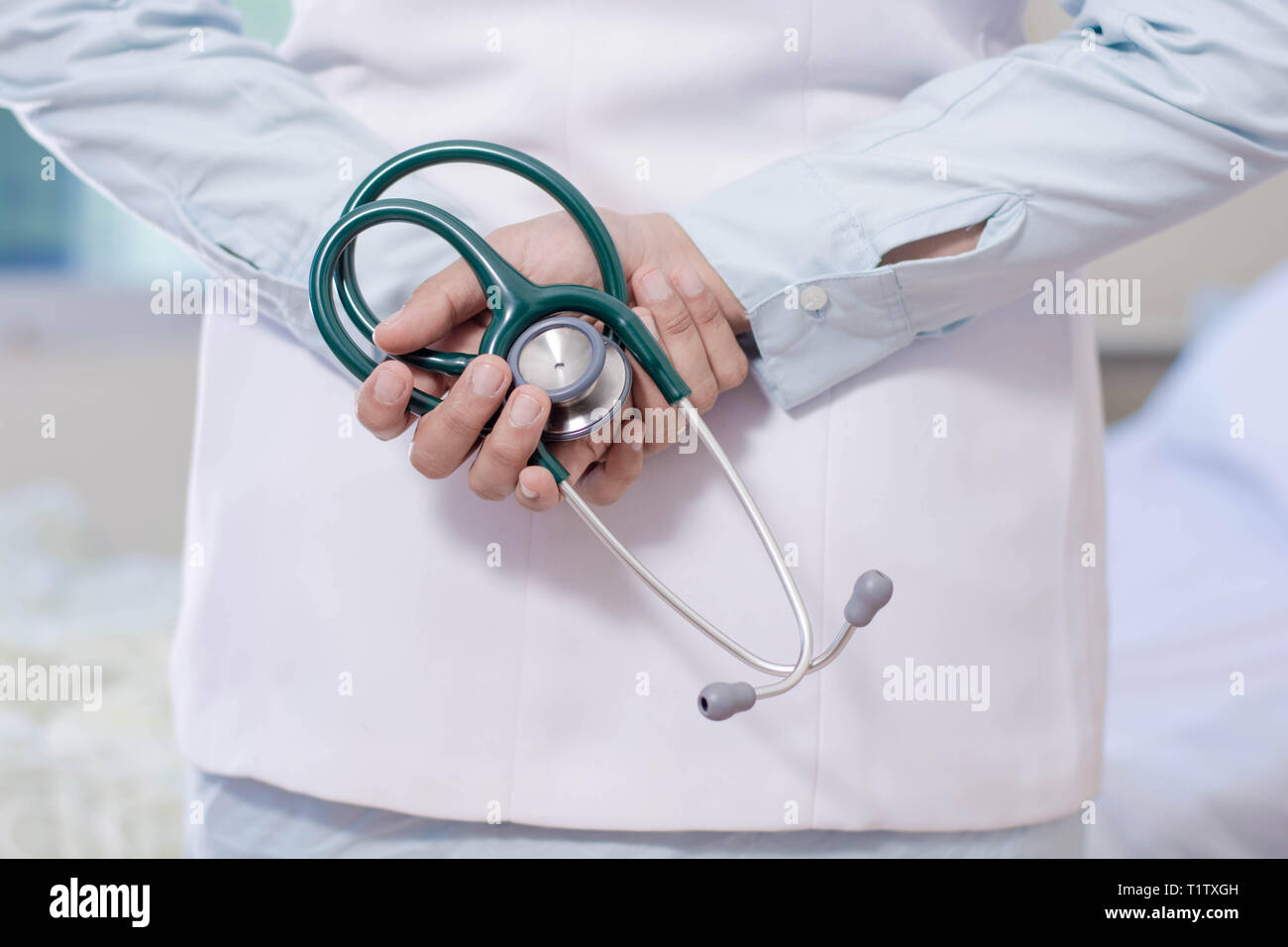 body part of female doctor hand inside hospital bed room Stock Photo ...