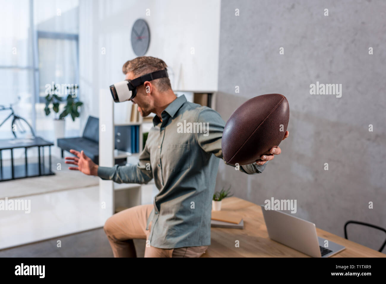 businessman wearing virtual reality headset and holding american ...