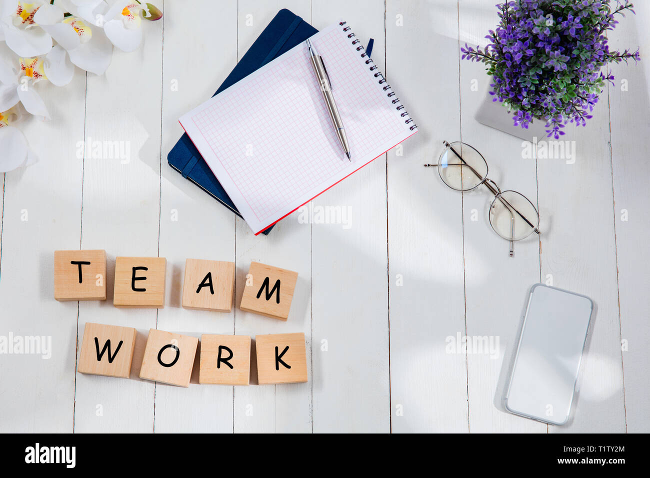 TEAM WORK. Message at at wooden cubes on a desk background. Lifestyle ...