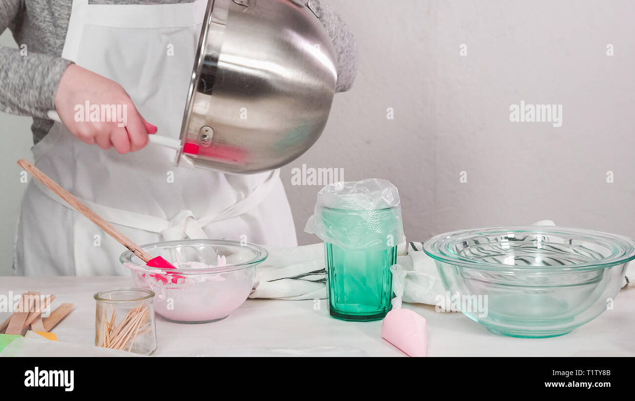 Step by step. Flat lay. Mixing royal icing in electric kitchen mixer ...