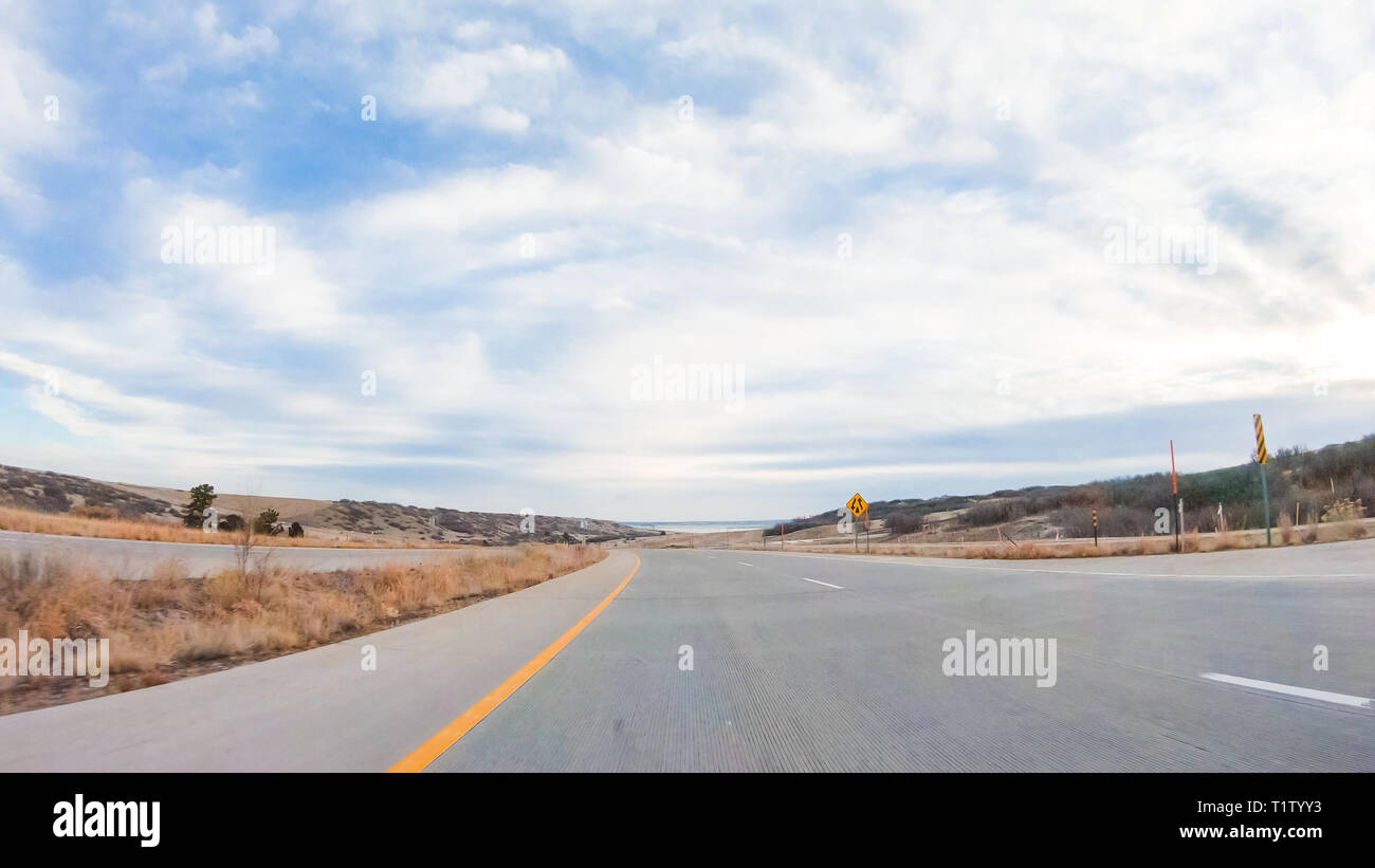 Driving on paved road in rural area Stock Photo - Alamy