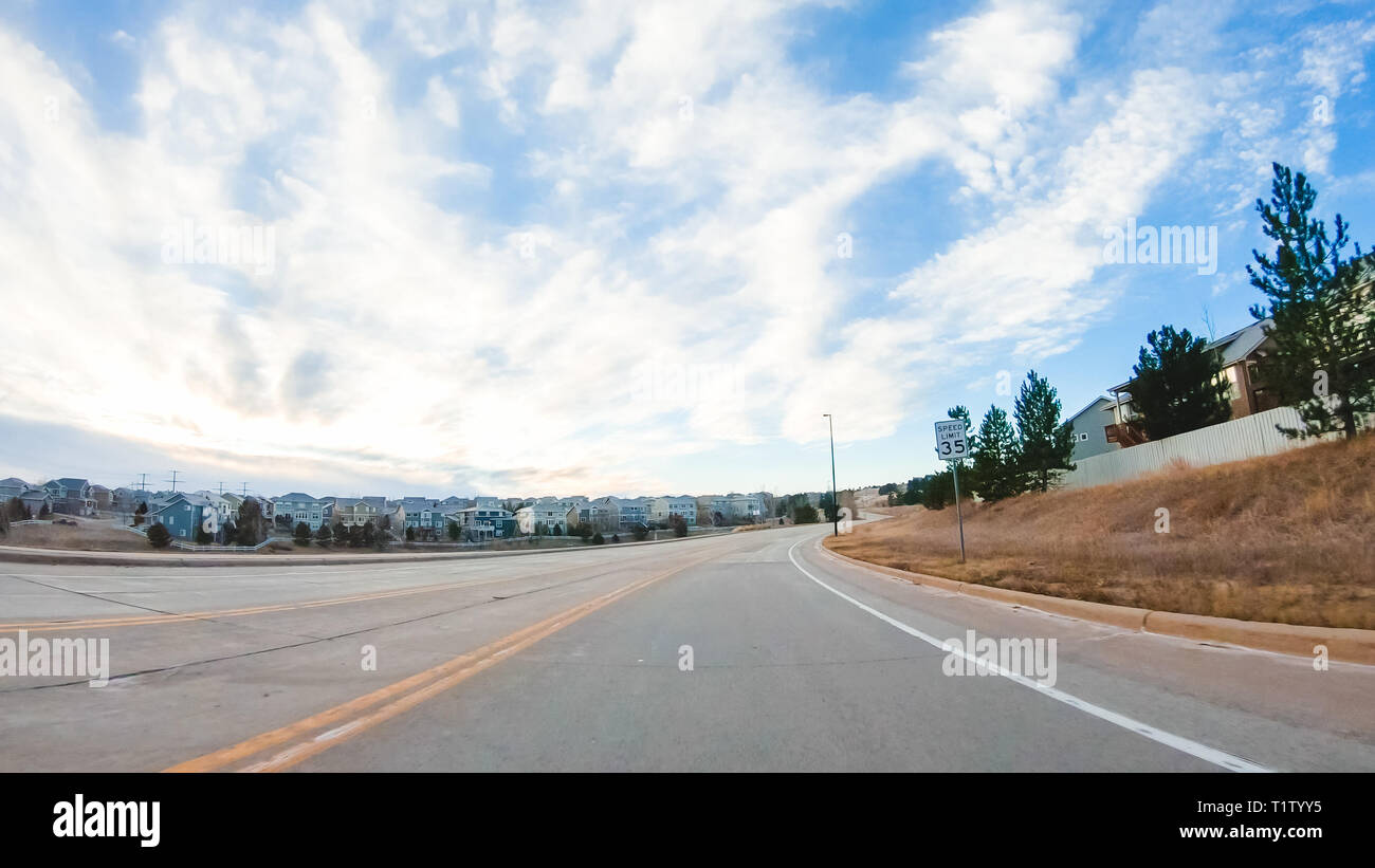 Driving through upscale residential neighborhood in suburbia Stock ...