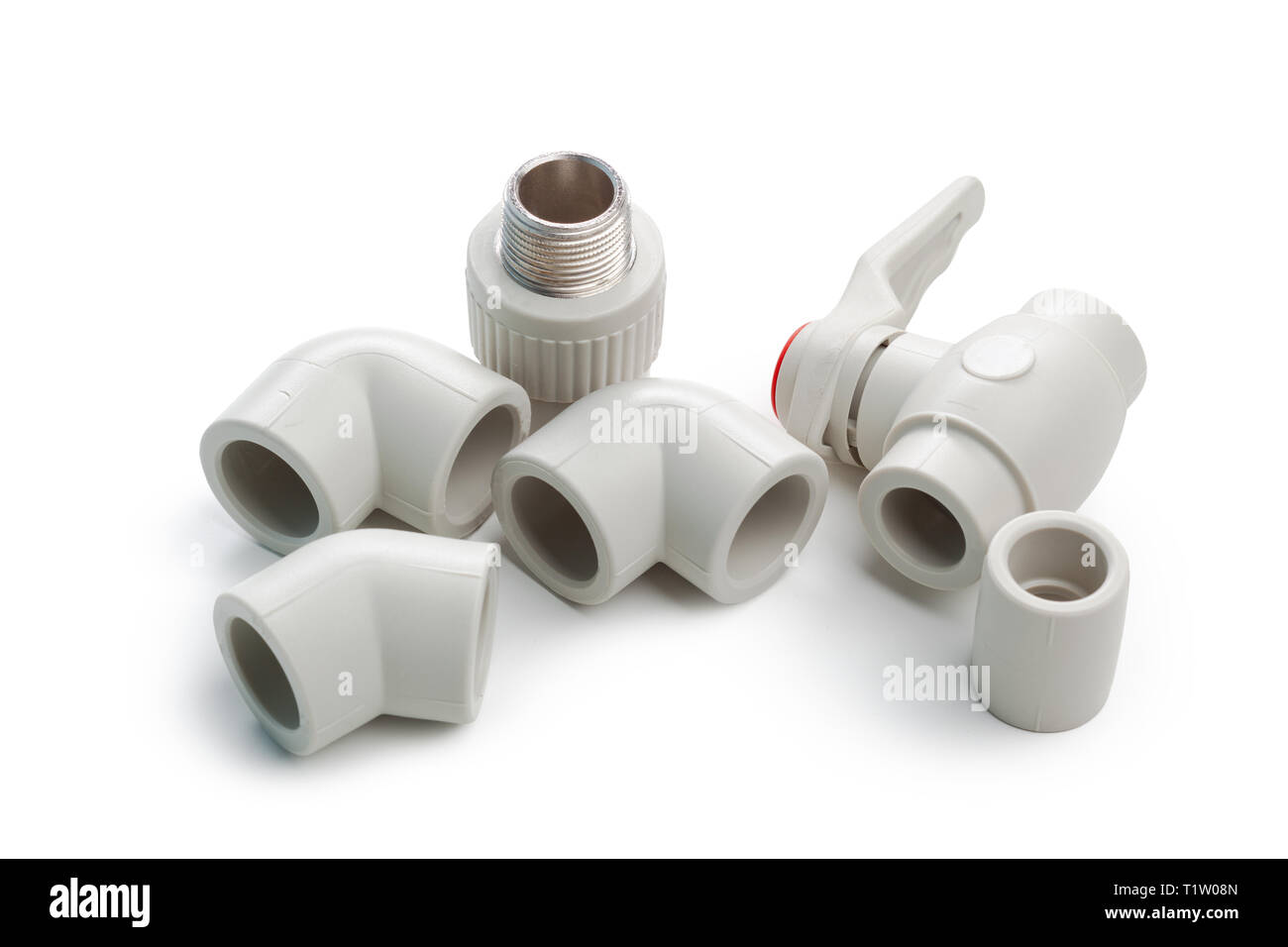 Set of metal-plastic plumbing couplings, adapters, plugs isolated on ...