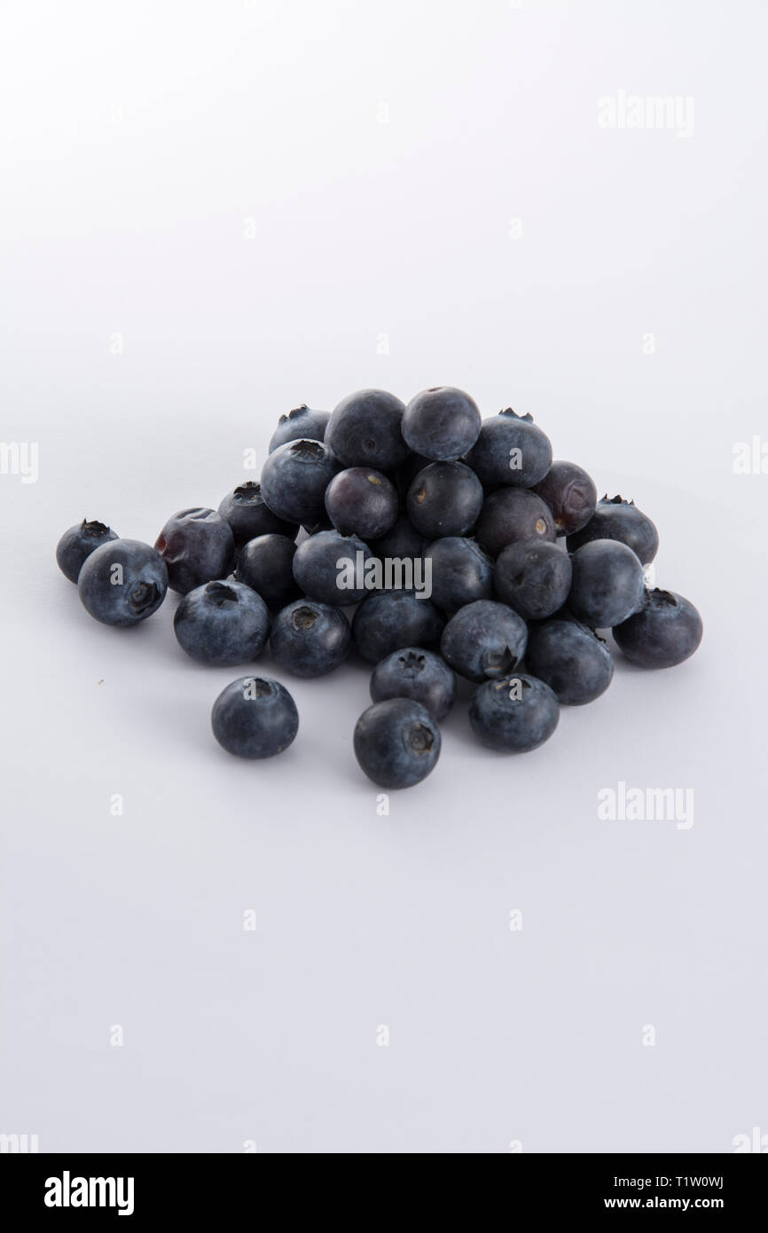Blueberries on white background Stock Photo - Alamy