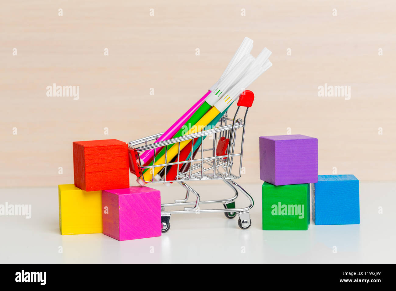 Stationery items in shopping trolley at left side Stock Photo - Alamy
