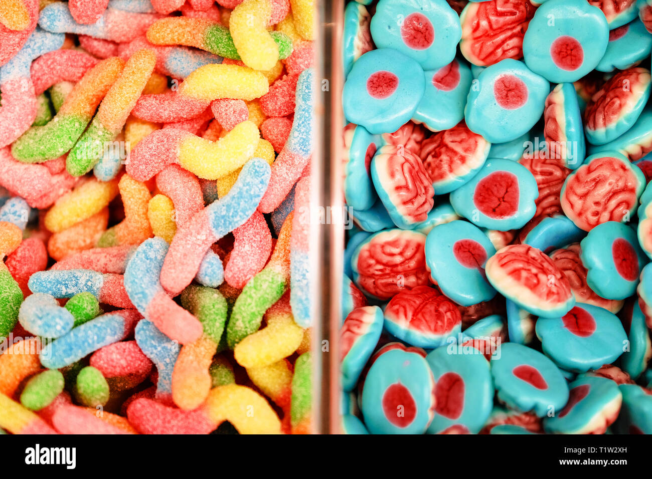 Red gummy piles hi-res stock photography and images - Alamy