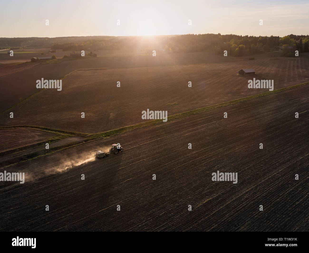 Agricultural tractor sunset hi-res stock photography and images - Alamy