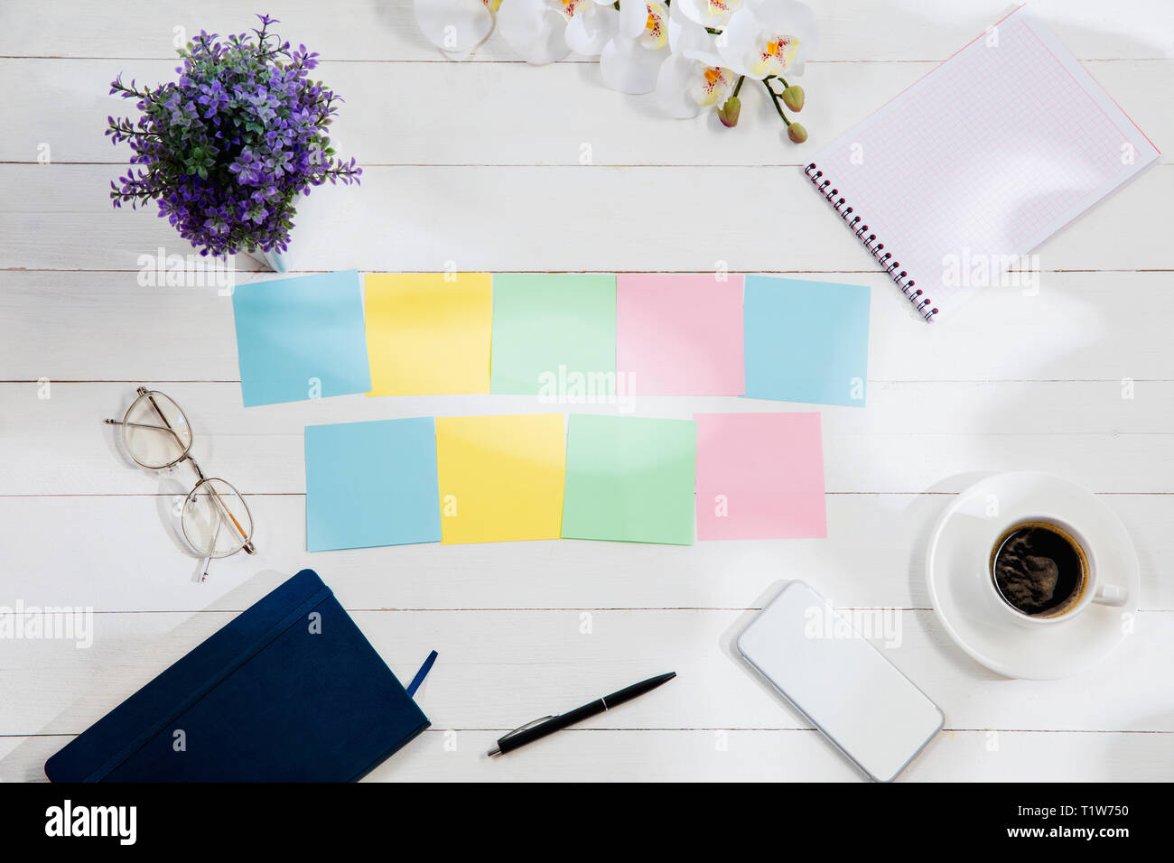 Message at colorful note papers on a desk background. Lifestyle, business, office, plan, goal ...