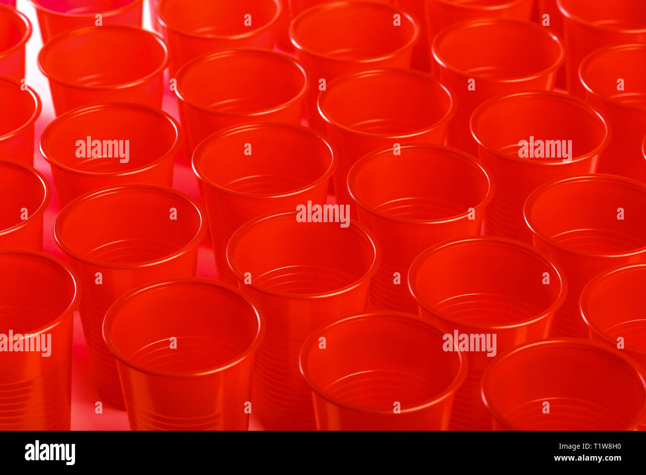 red disposable plastic glasses Stock Photo - Alamy