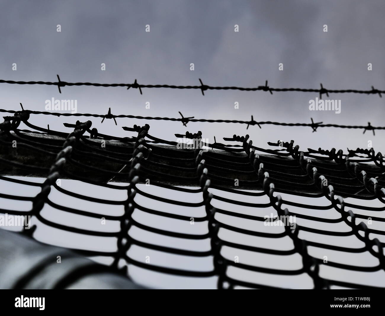 High security fence hi-res stock photography and images - Alamy