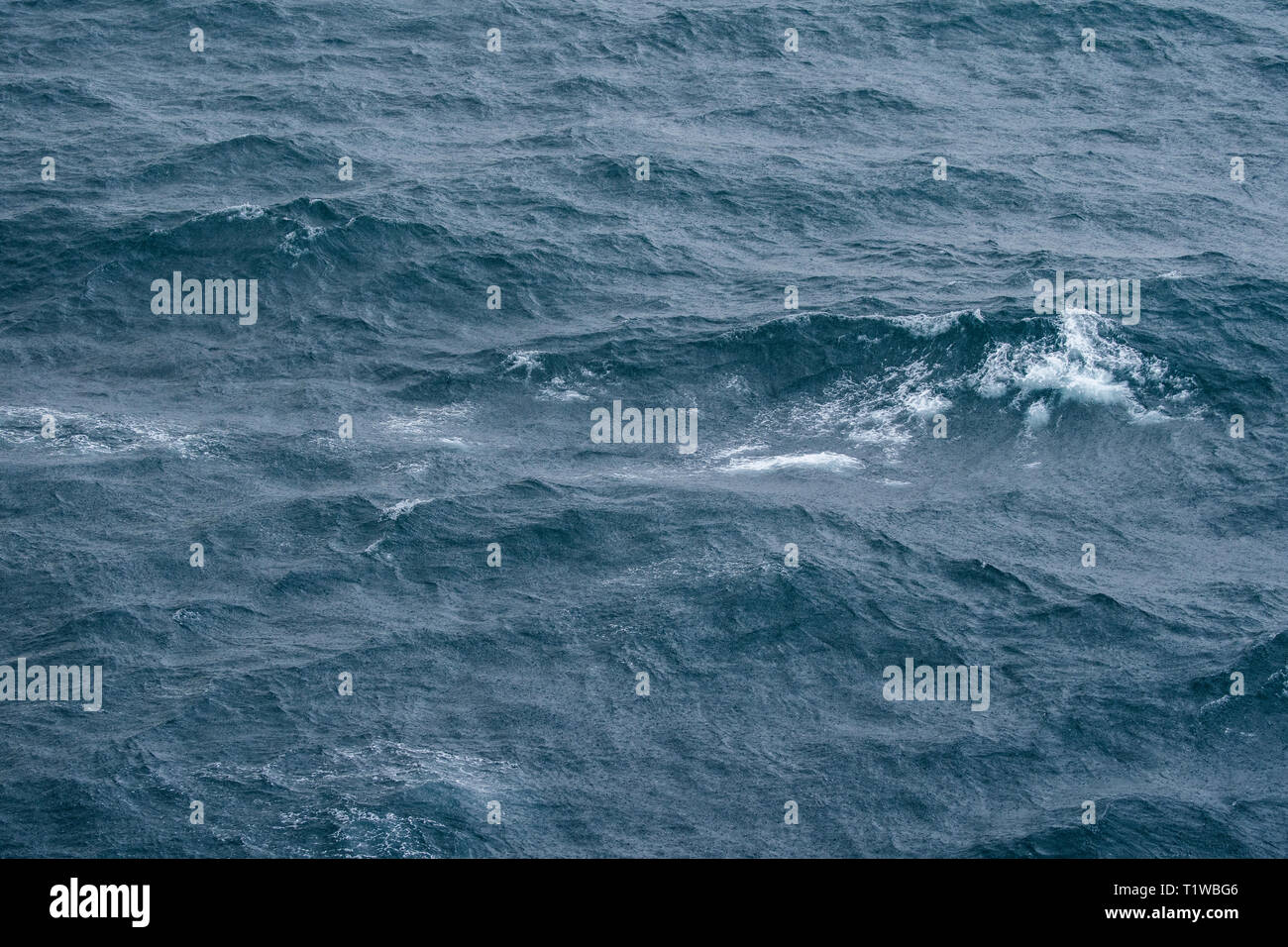 Sea surface with waves and tide aerial view background Stock Photo - Alamy