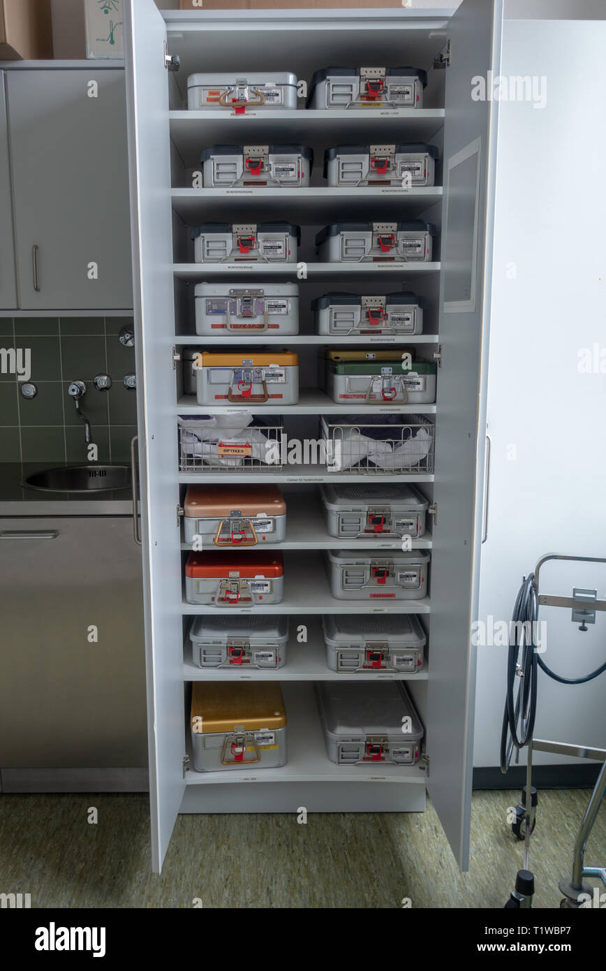 a cabinet full of surgical instruments Container Stock Photo - Alamy
